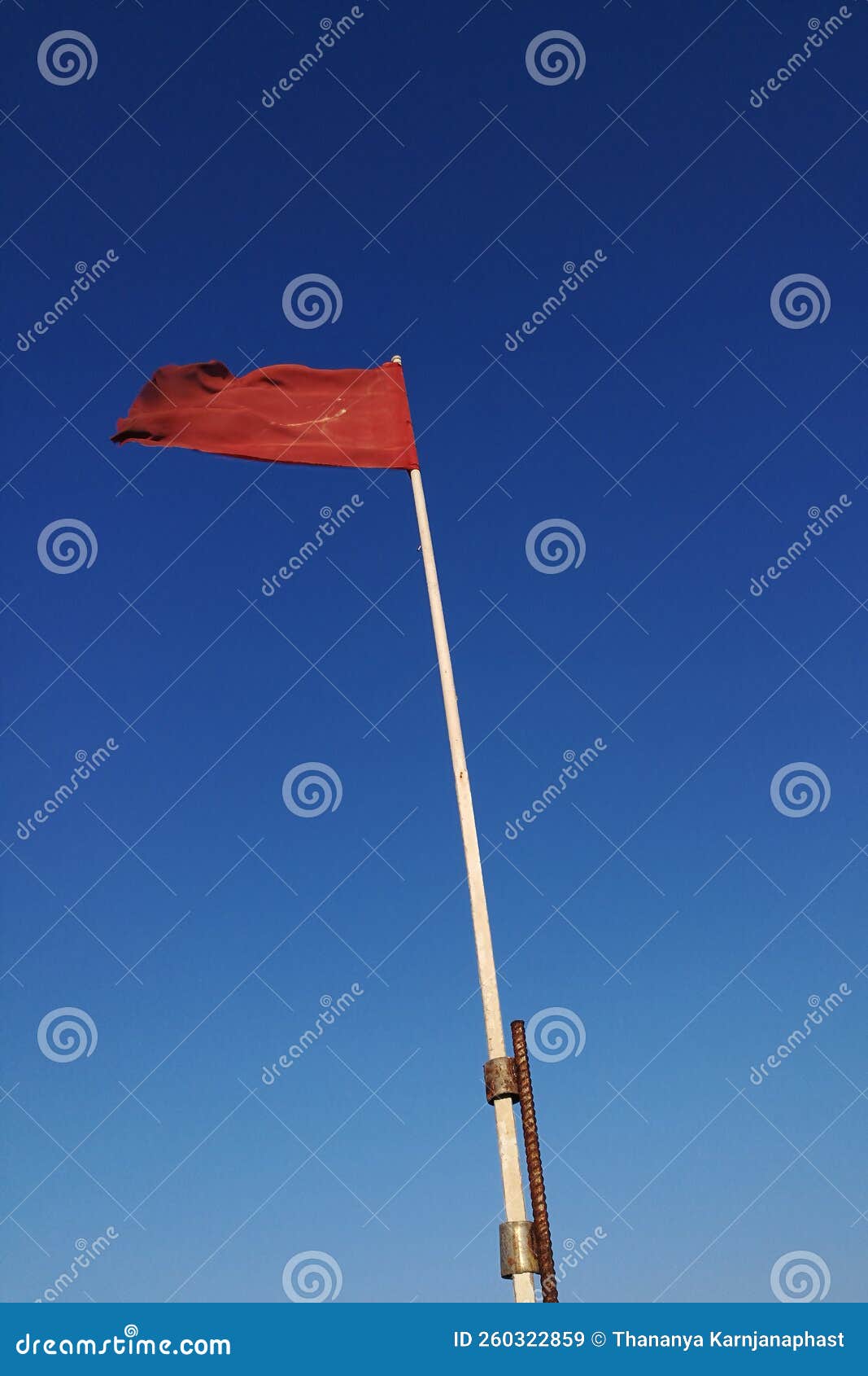 Red warning flag waving stock image. Image of blue, dangerous - 260322859