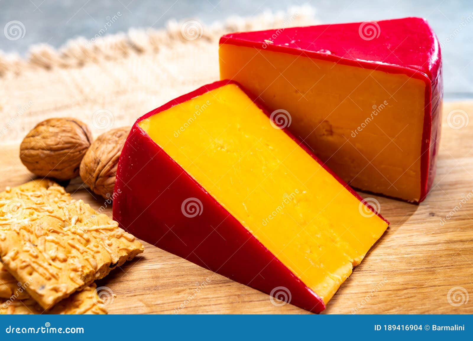 Red Waxed Yellow Cheddar Cheese and Crackers with Grated Cheese Stock ...