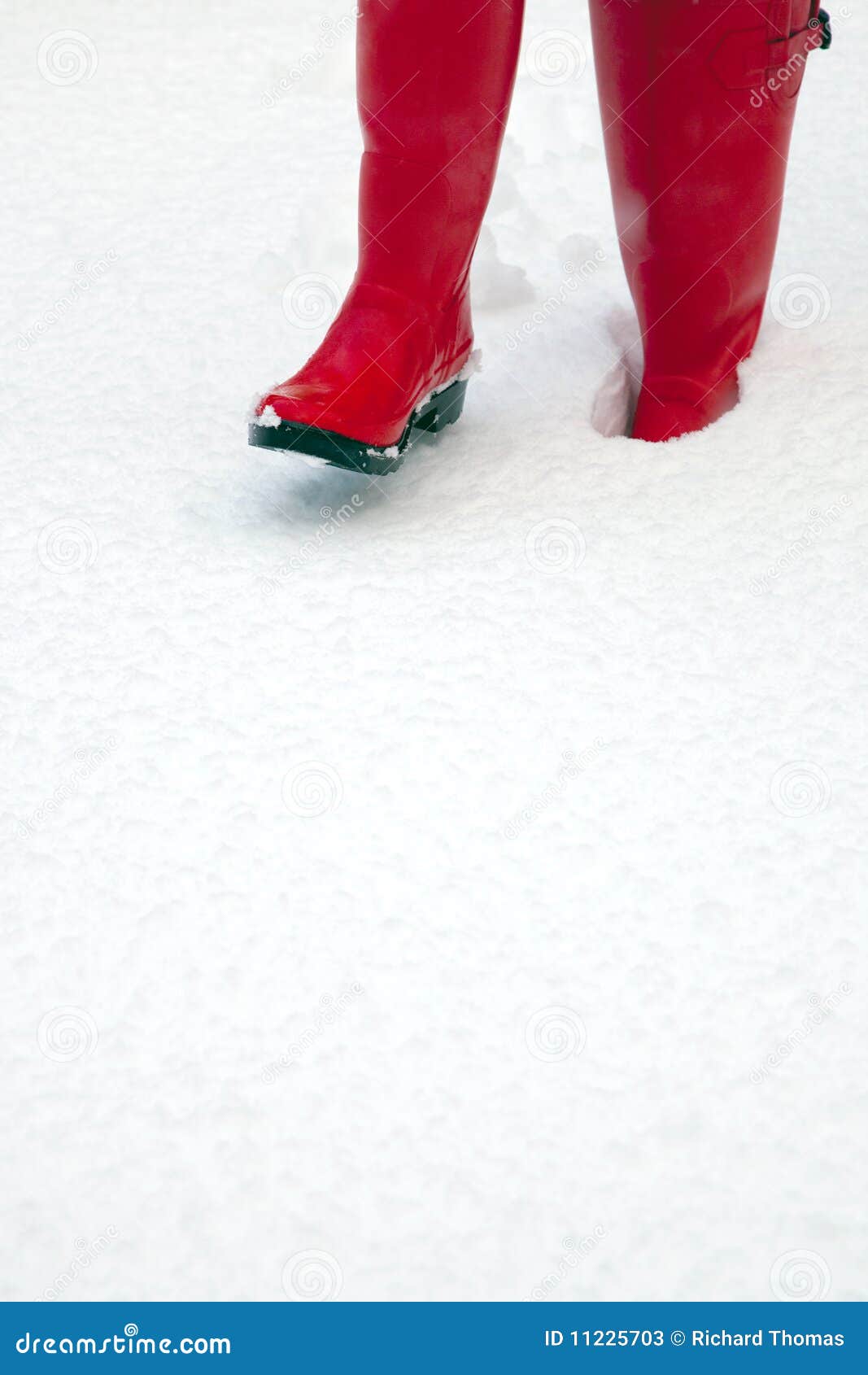 Red wellies in the snow stock image. Image of boots, winter - 11225703