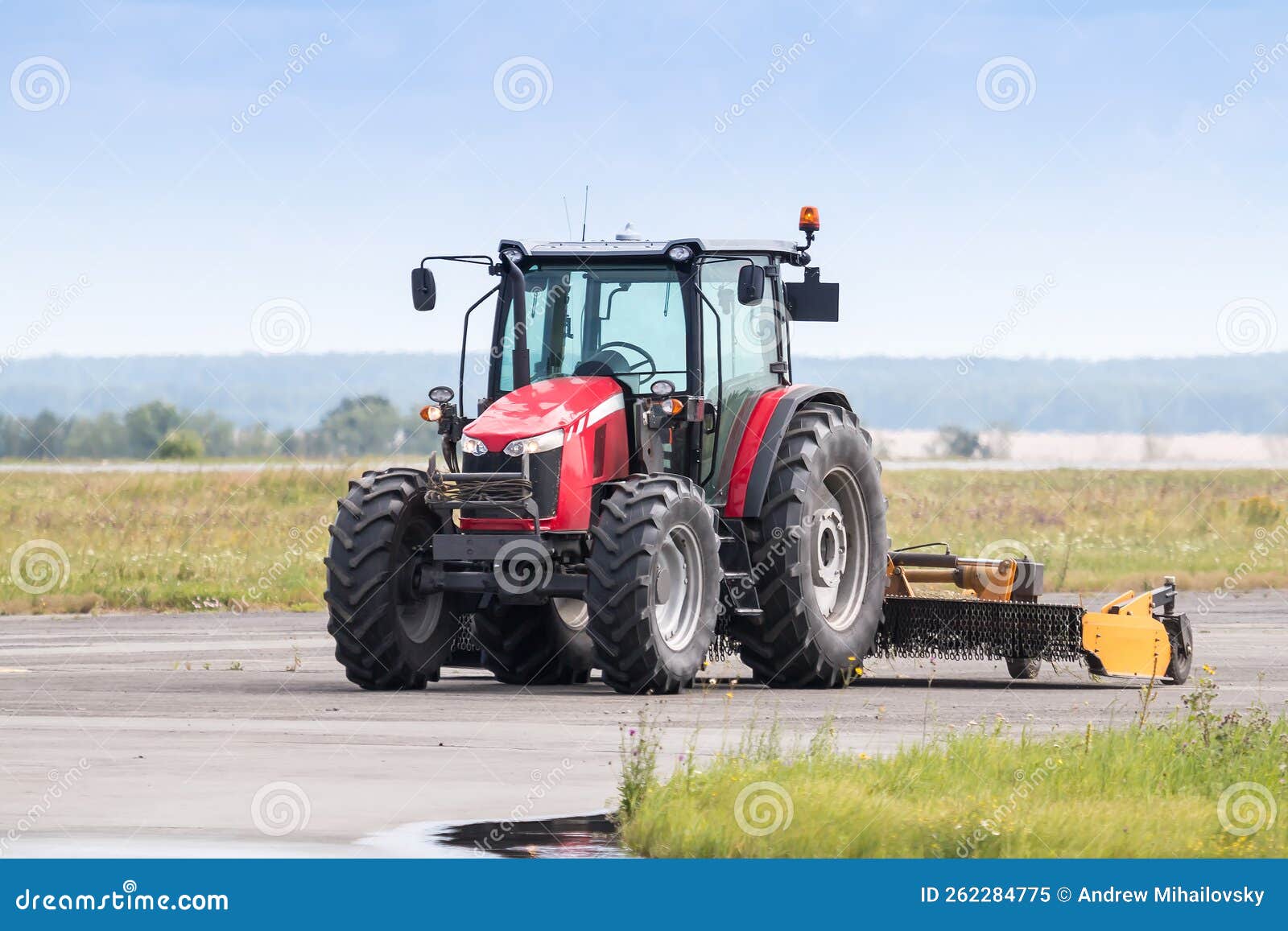 Wheel Tractor with Lawn Mower on the Road Stock Image - Image of ...