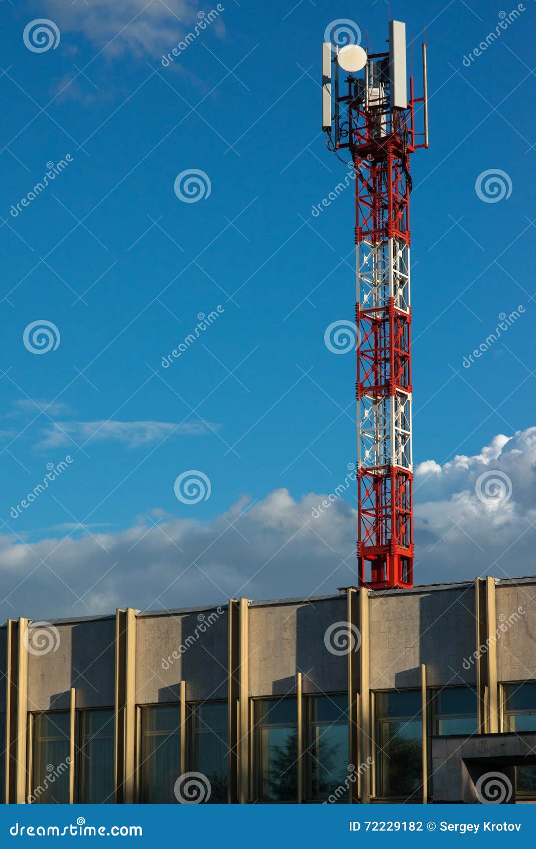 Red and White Antenna Tower on the Roof of the Building Stock Photo ...