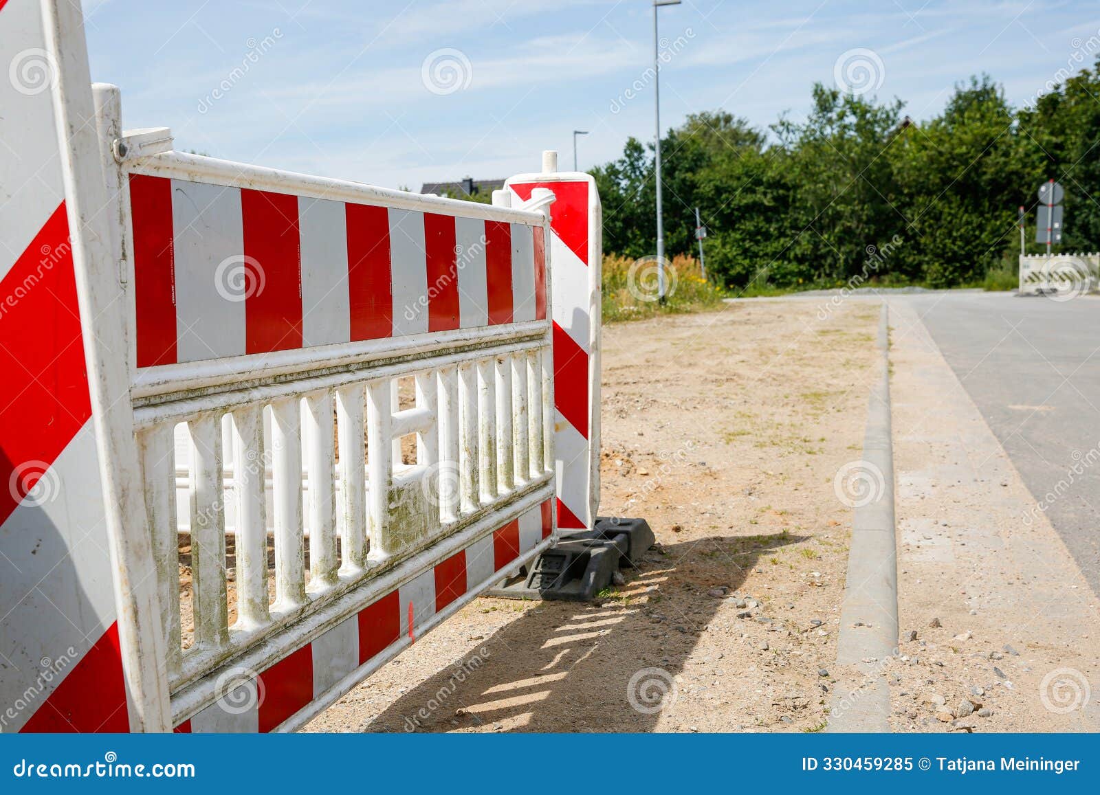 Red and White Barrier at a Construction Site Outdoors Stock Image ...