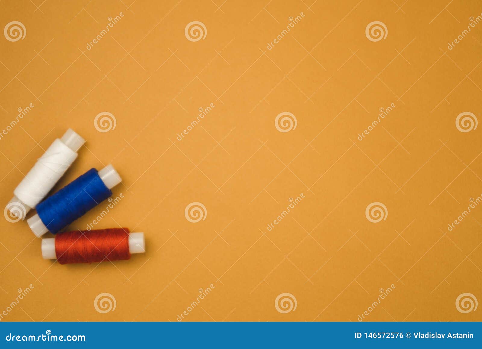 Red White and Blue Threads on an Orange Background Stock Photo - Image ...