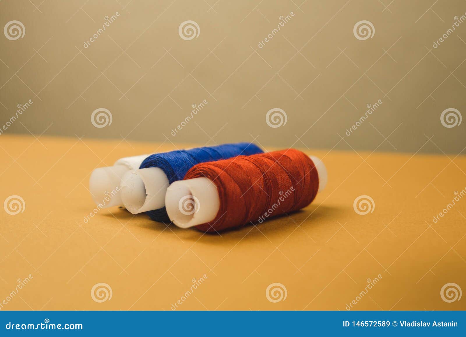 Red White and Blue Threads on an Orange Background Stock Image - Image ...