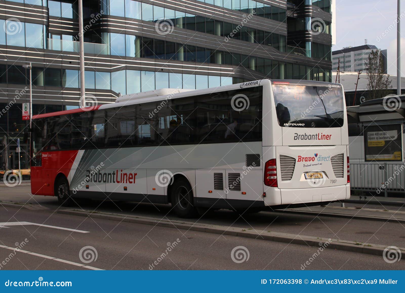 Red and White Brabantliner Bus at Platform for Fast Bus Transportation ...