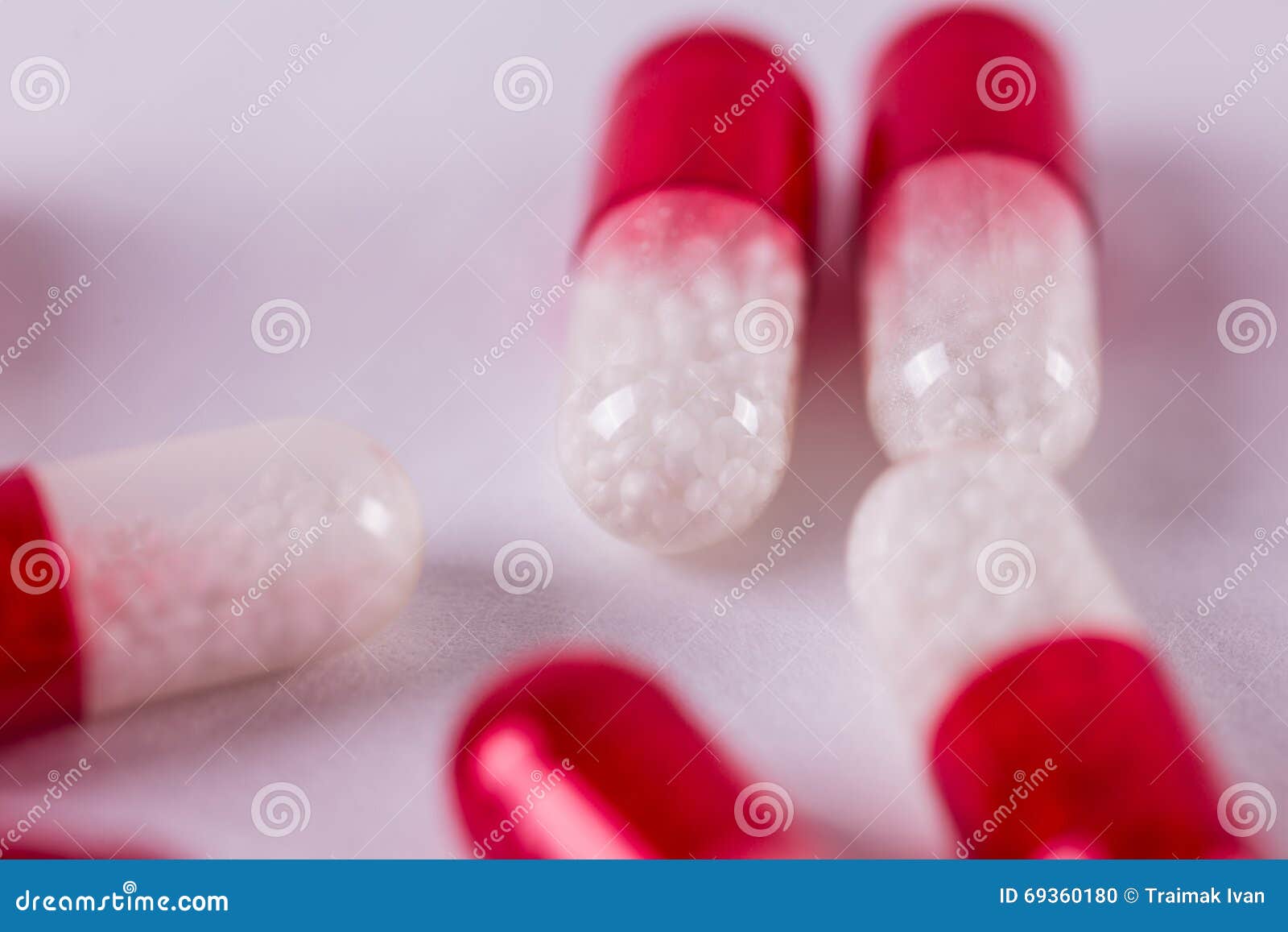 Red-white Capsules on a White Background Stock Photo - Image of healthy ...