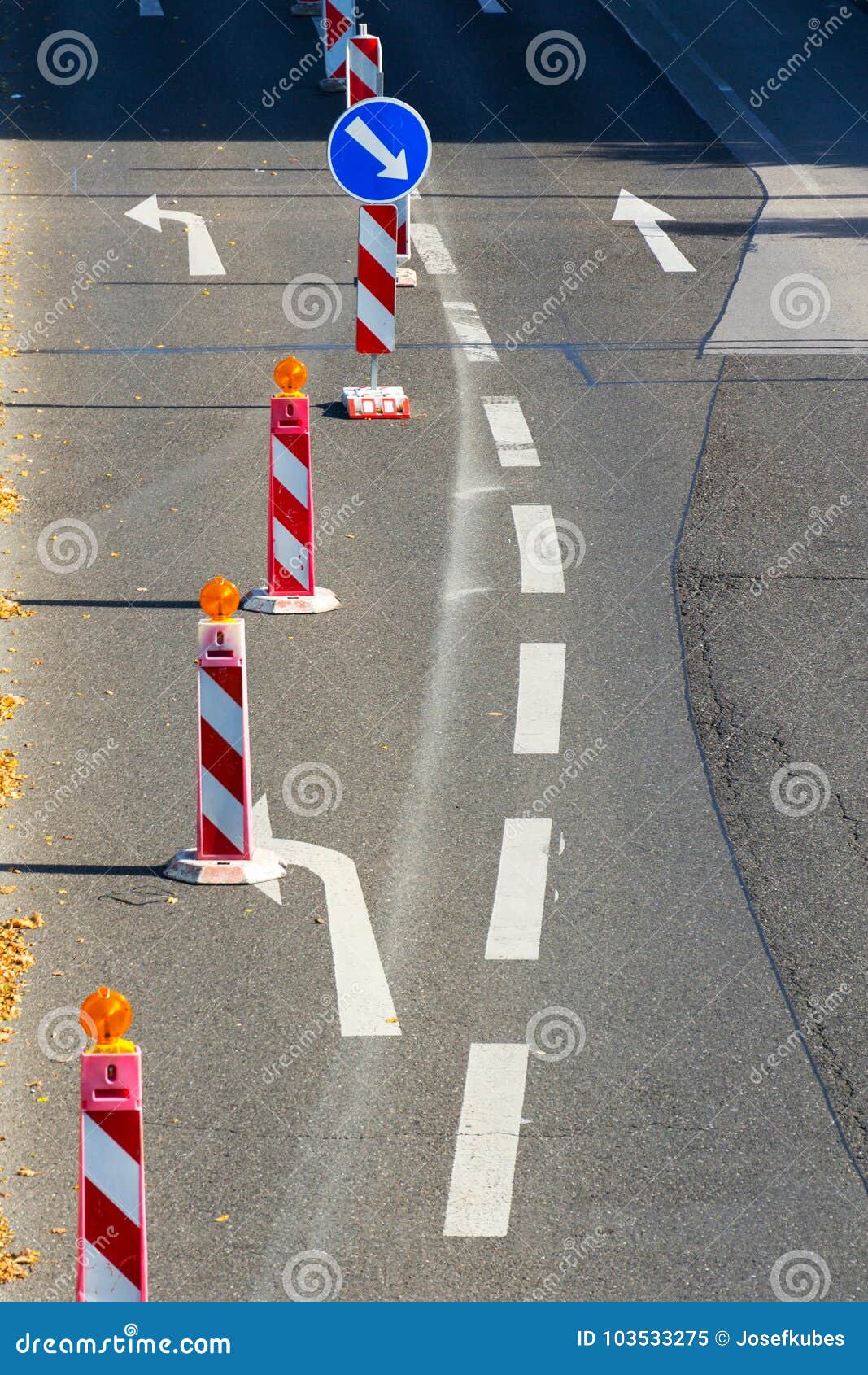 Red and White Construction Roadblocks with Direction Signs, Sunny Day ...