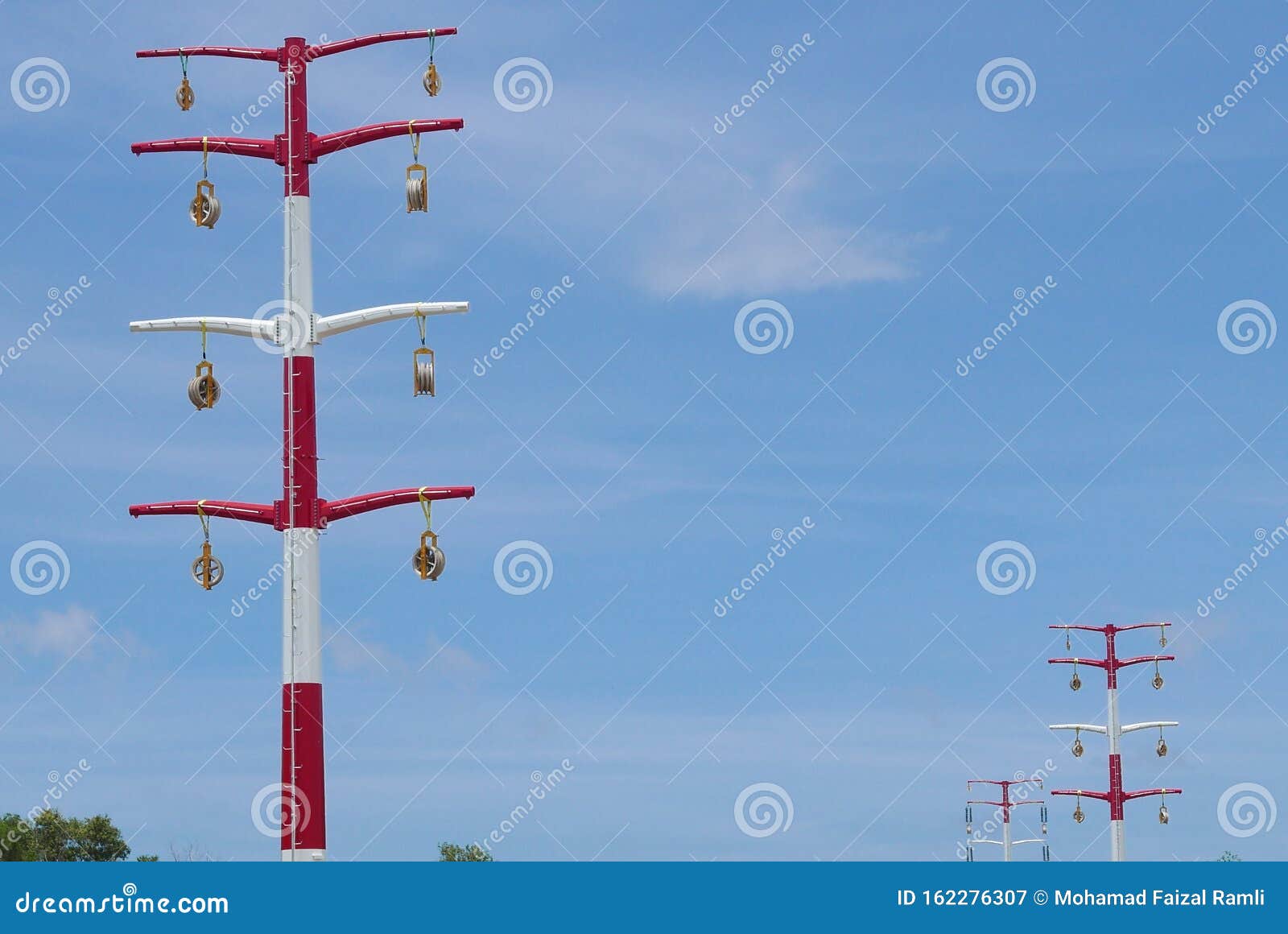 Red and White Electrical Pole with Blue Sky Background Stock Image ...