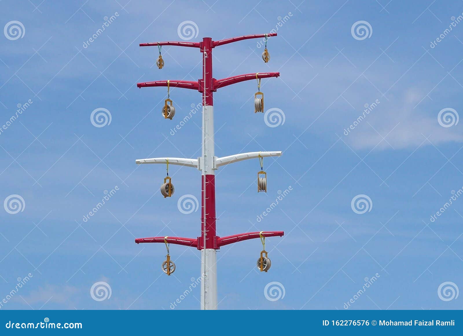 Red and White Electrical Pole with Blue Sky Background Stock Photo ...