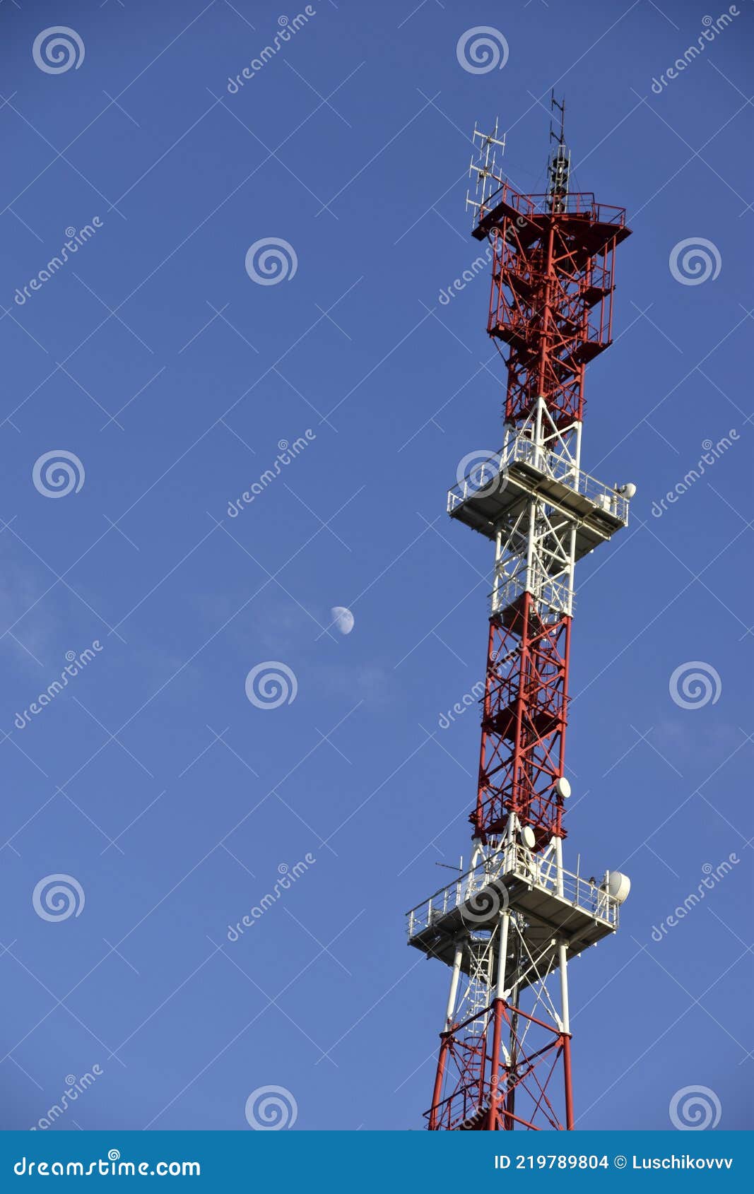 Red and White High Rise Communication Tower Antenna in the City with ...