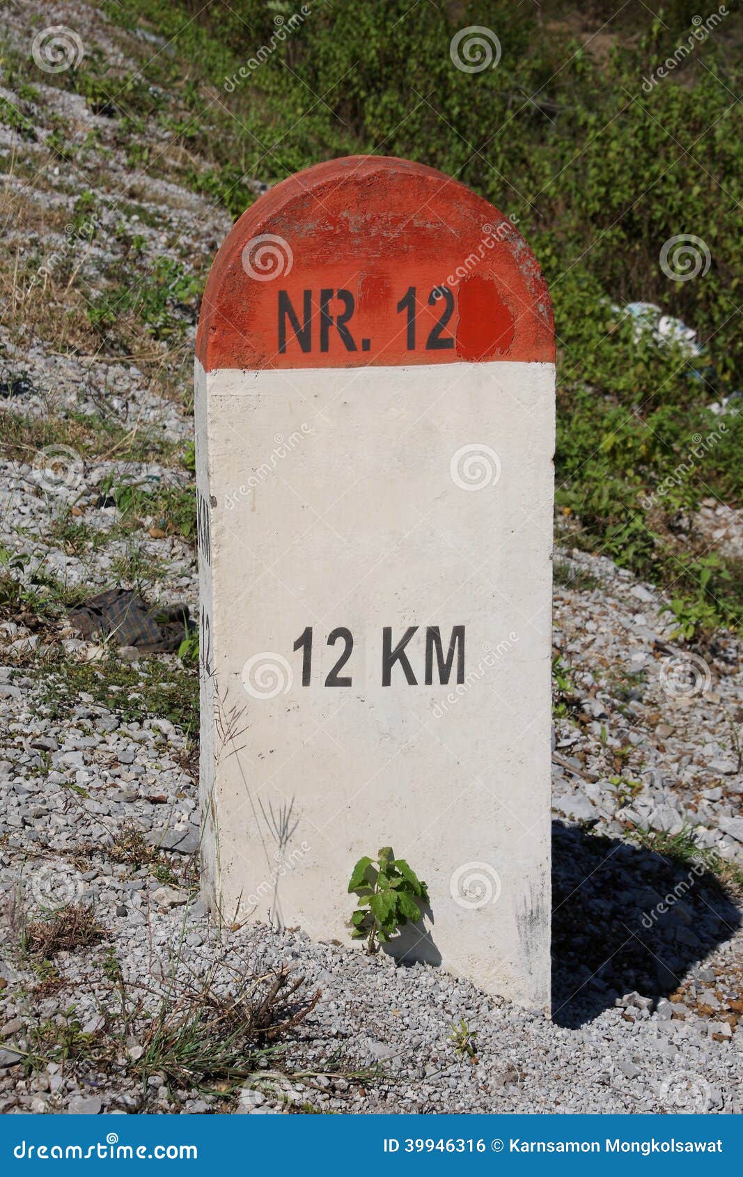 Red and white milestone stock photo. Image of marker - 39946316