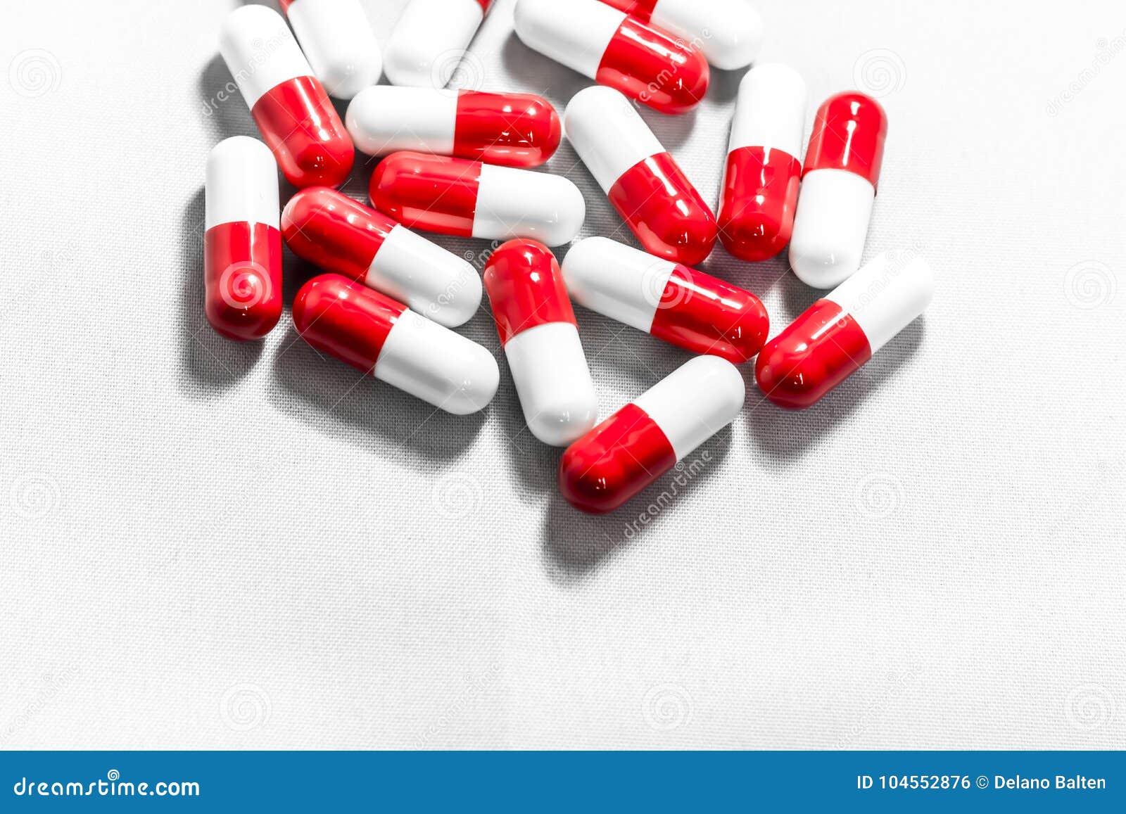 Red and white pills stock photo. Image of capsule, antibiotics - 104552876