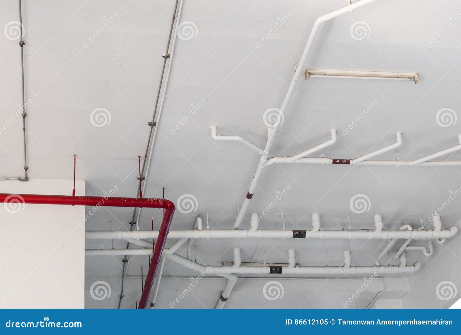 Red and White Pipes Under Ceiling in Building Stock Image - Image of ...