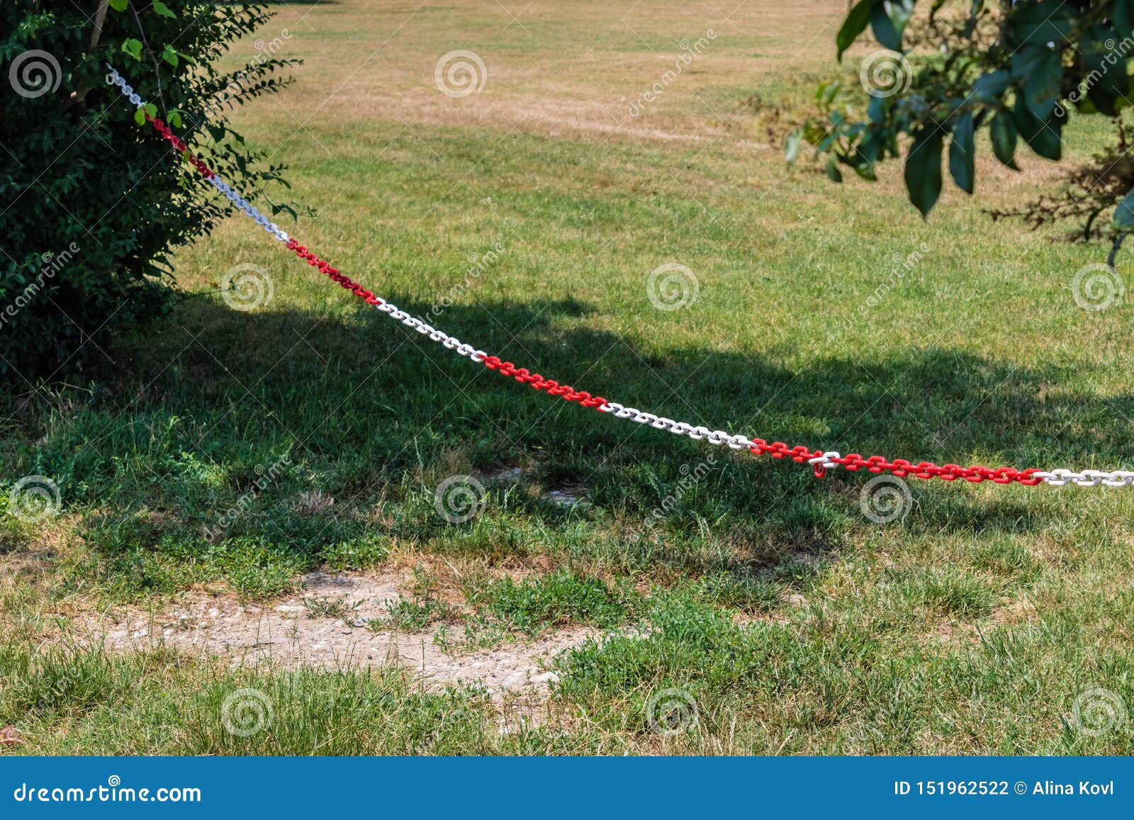 Red and White Plastic Chain Prohibiting Passage/parking, Hanging on Two ...