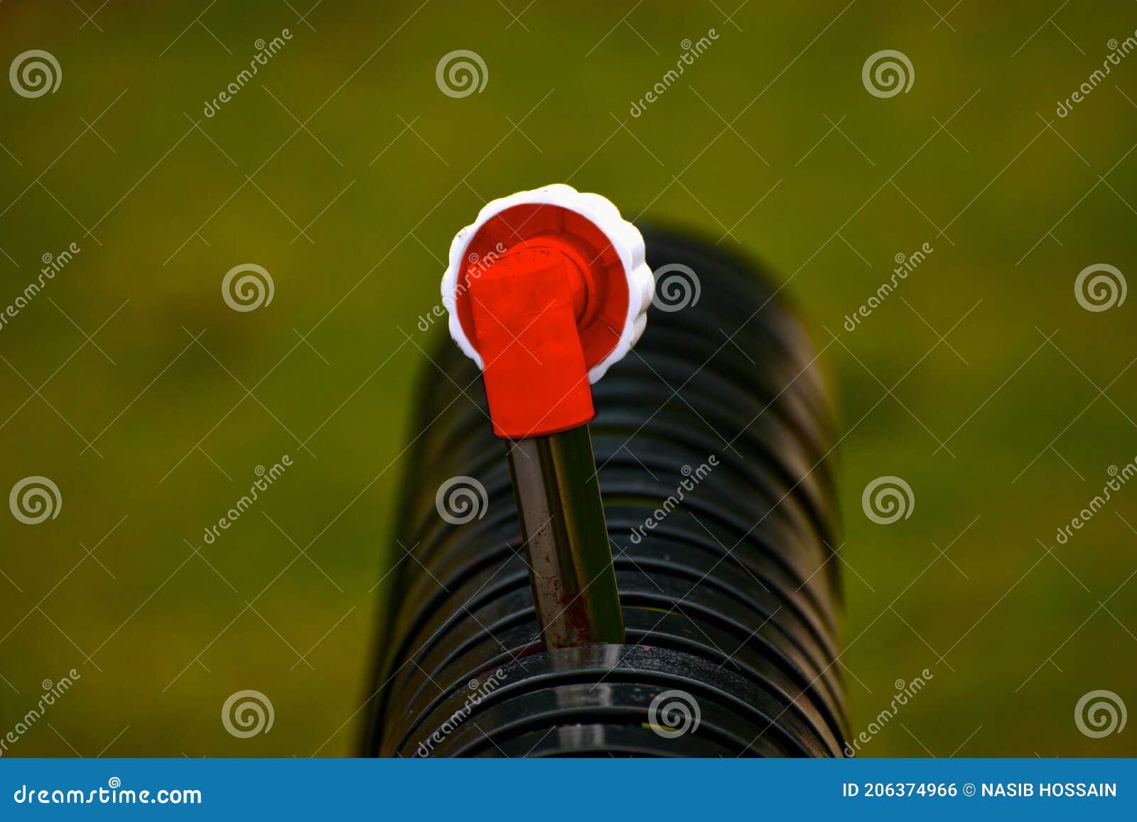 Red and White Plastic Object with Metallic Structure Stock Photo ...