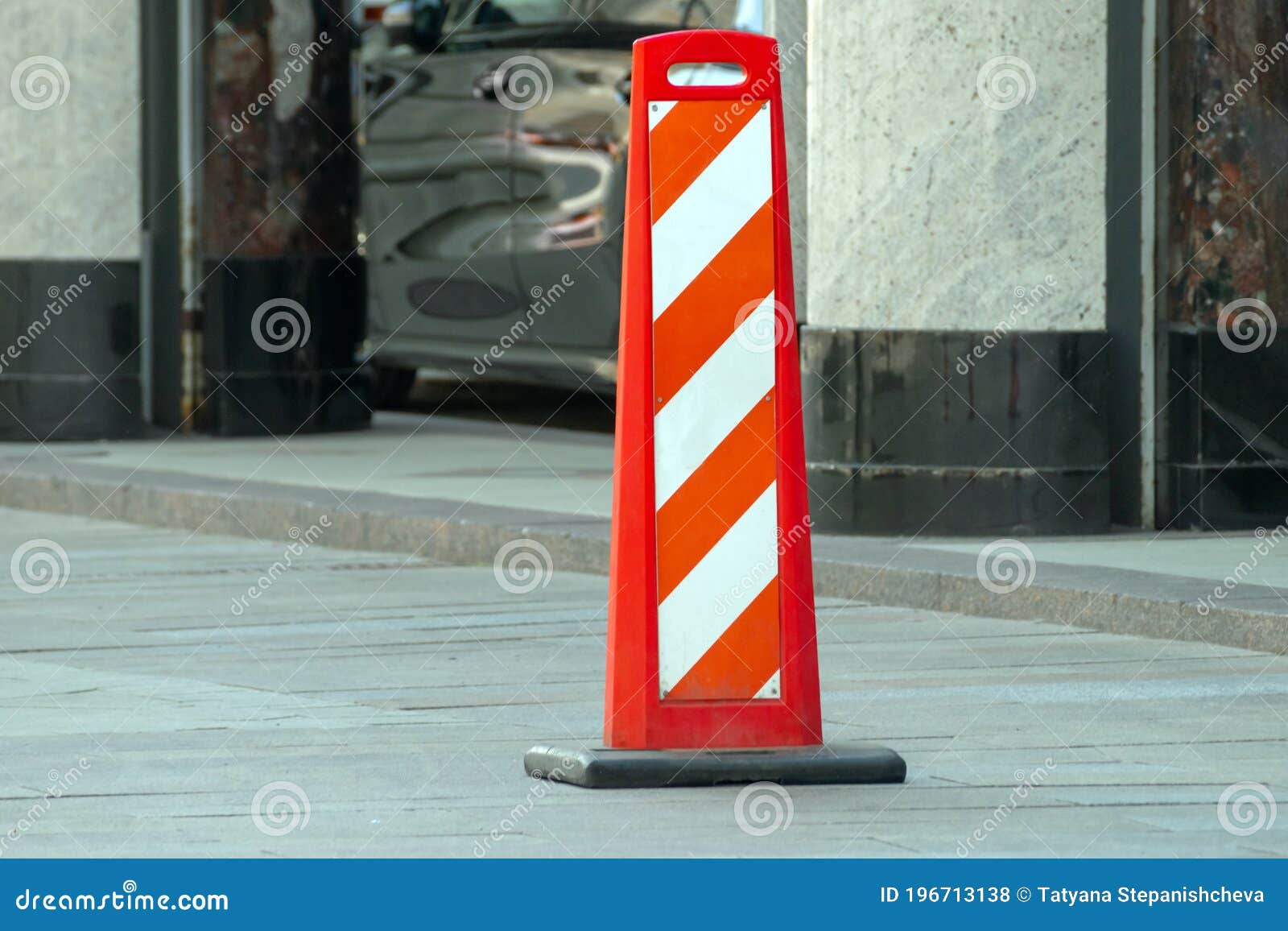 A Red and White Post that Prohibits Traffic Stands in the Middle of the ...
