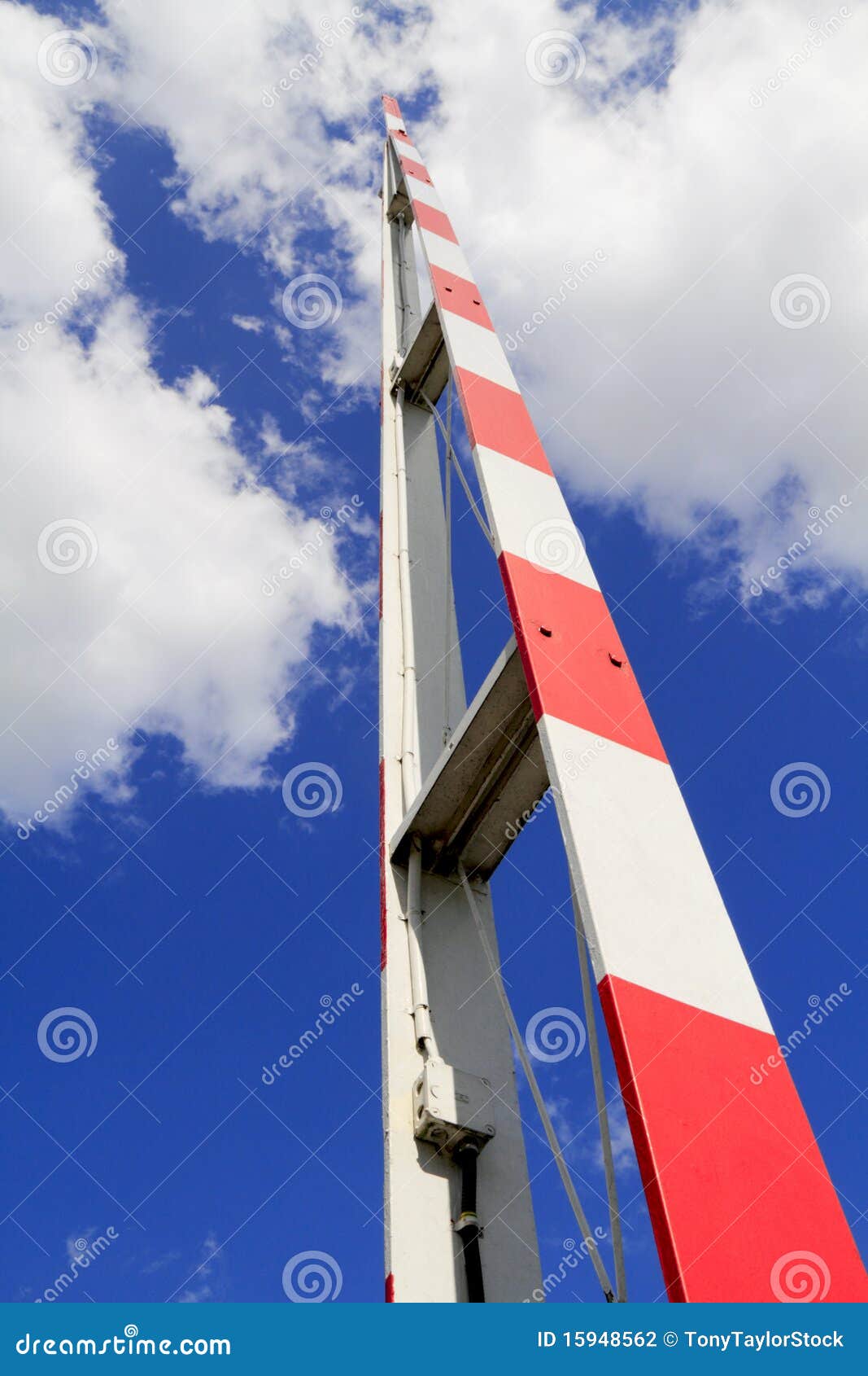 Red and White Raised Barrier Stock Photo - Image of fence, metal: 15948562