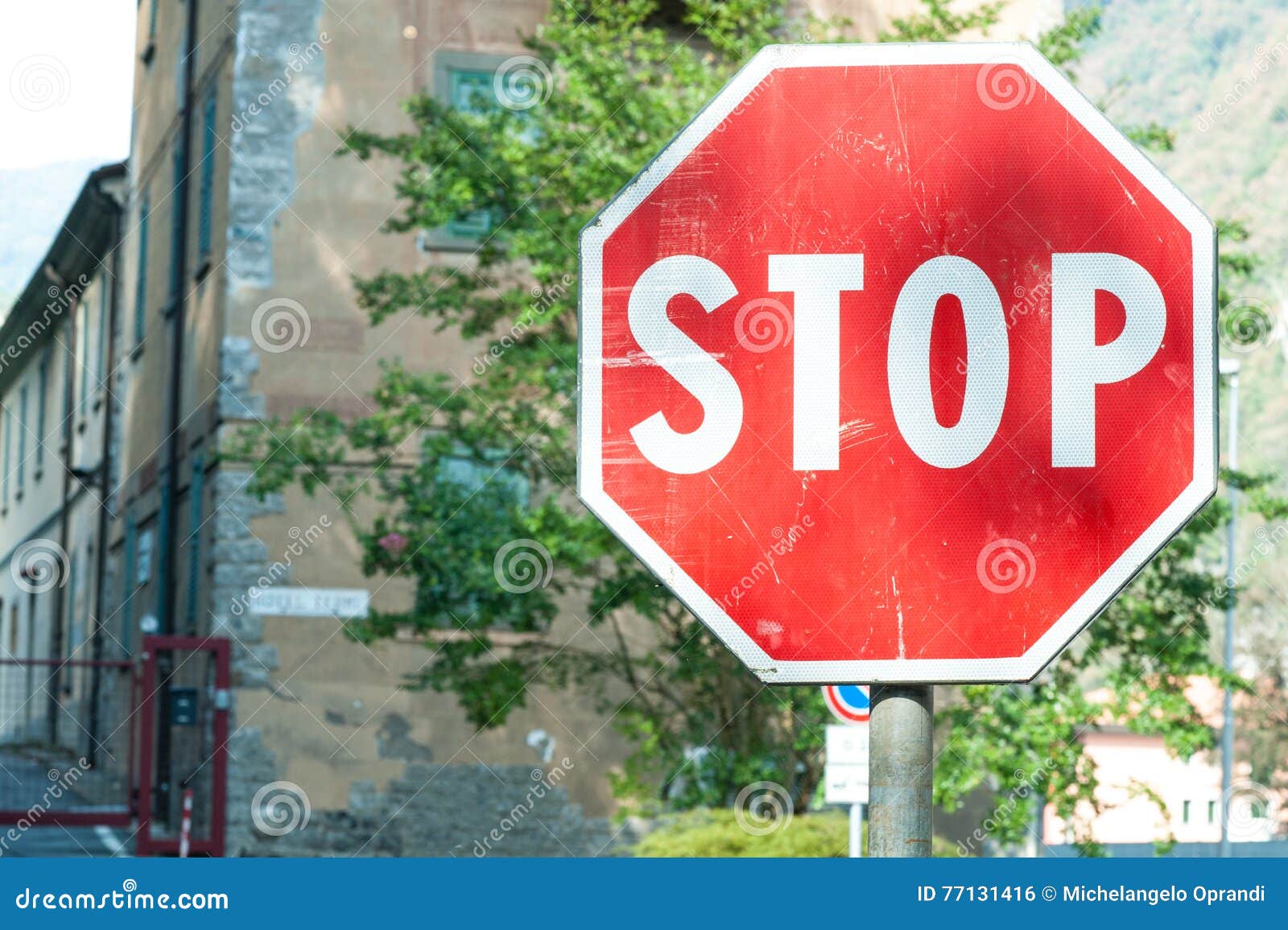 Red and White Stop Road Sign in a Street Stock Photo - Image of stop ...