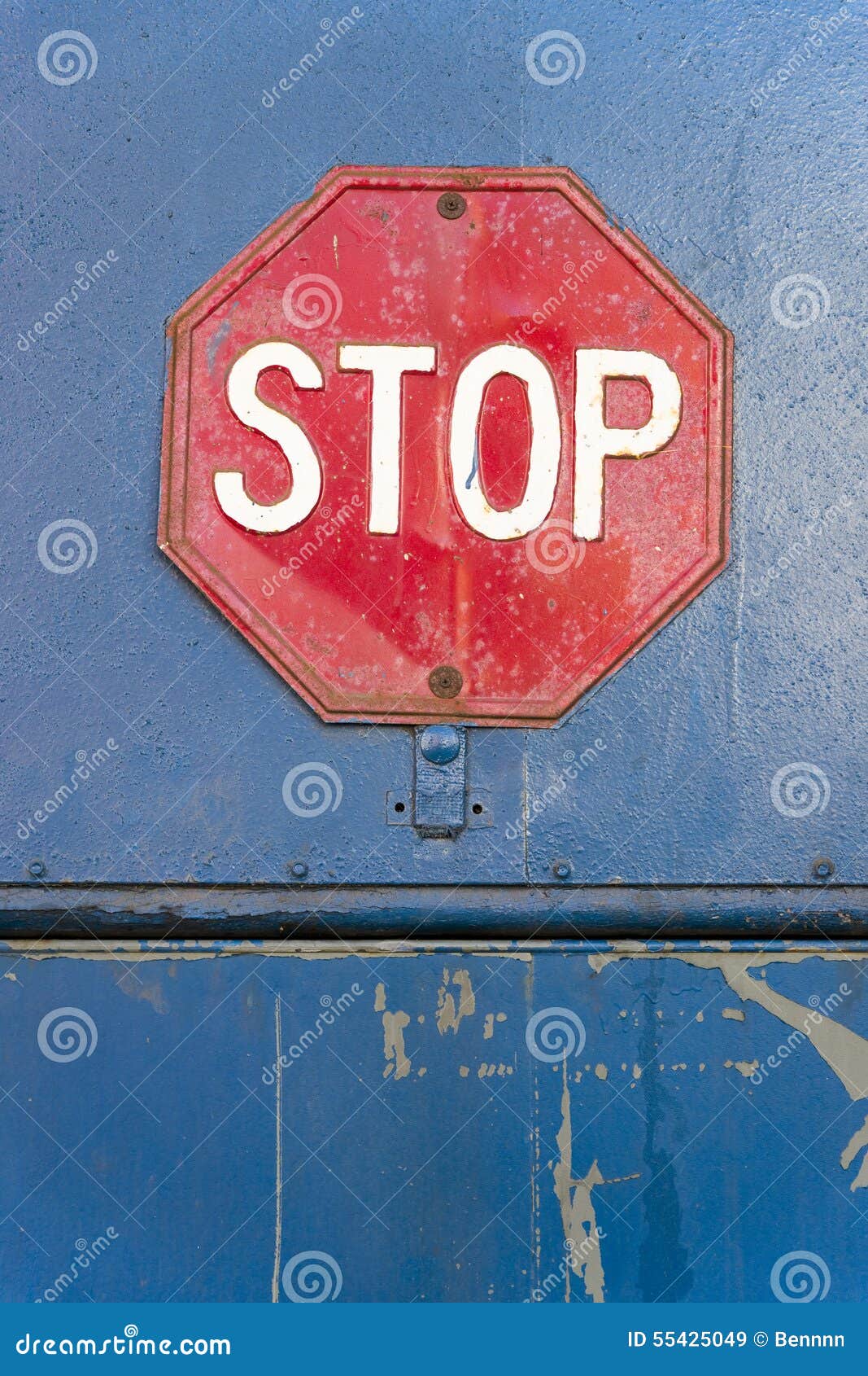 Red and White Stop Sign Bolted To a Wall. Stock Image - Image of white ...