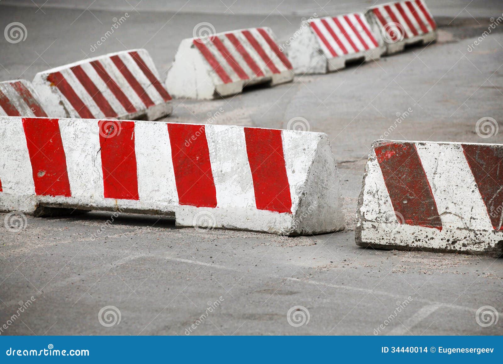 Red and White Striped Concrete Road Barriers Stock Photo - Image of ...