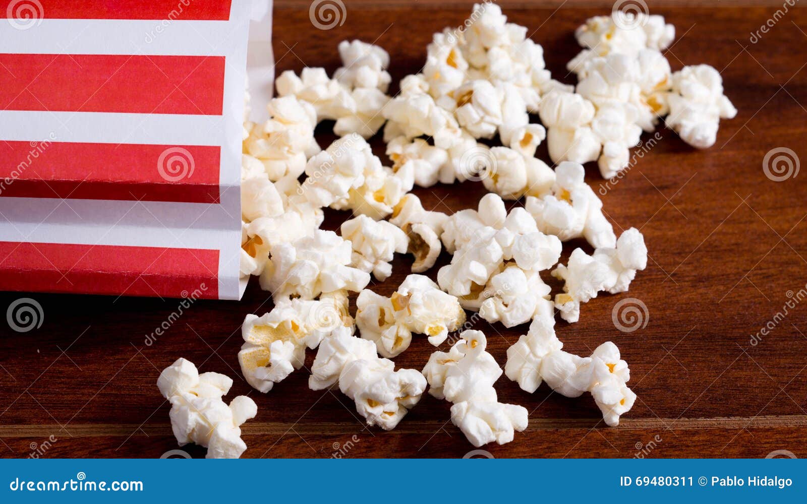 Red White Striped Container Box Lying Tipped Over on Wooden Surface ...