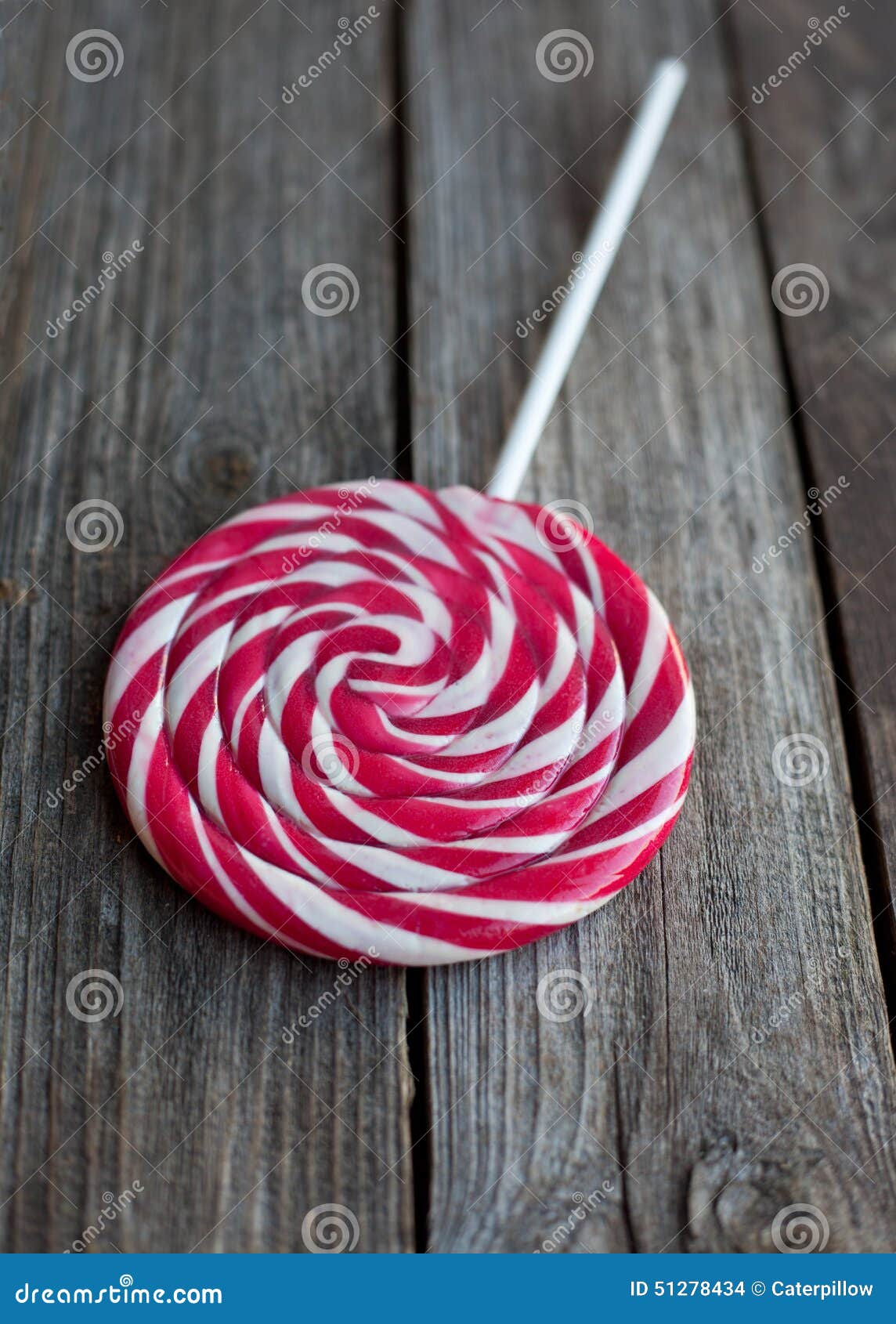 Red and White Sweet Lollipop on Wooden Table Stock Photo - Image of ...