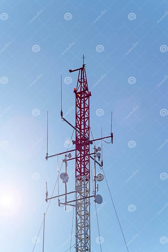 Red And White Telecommunication Antenna Mast Or Mobile Tower Stock