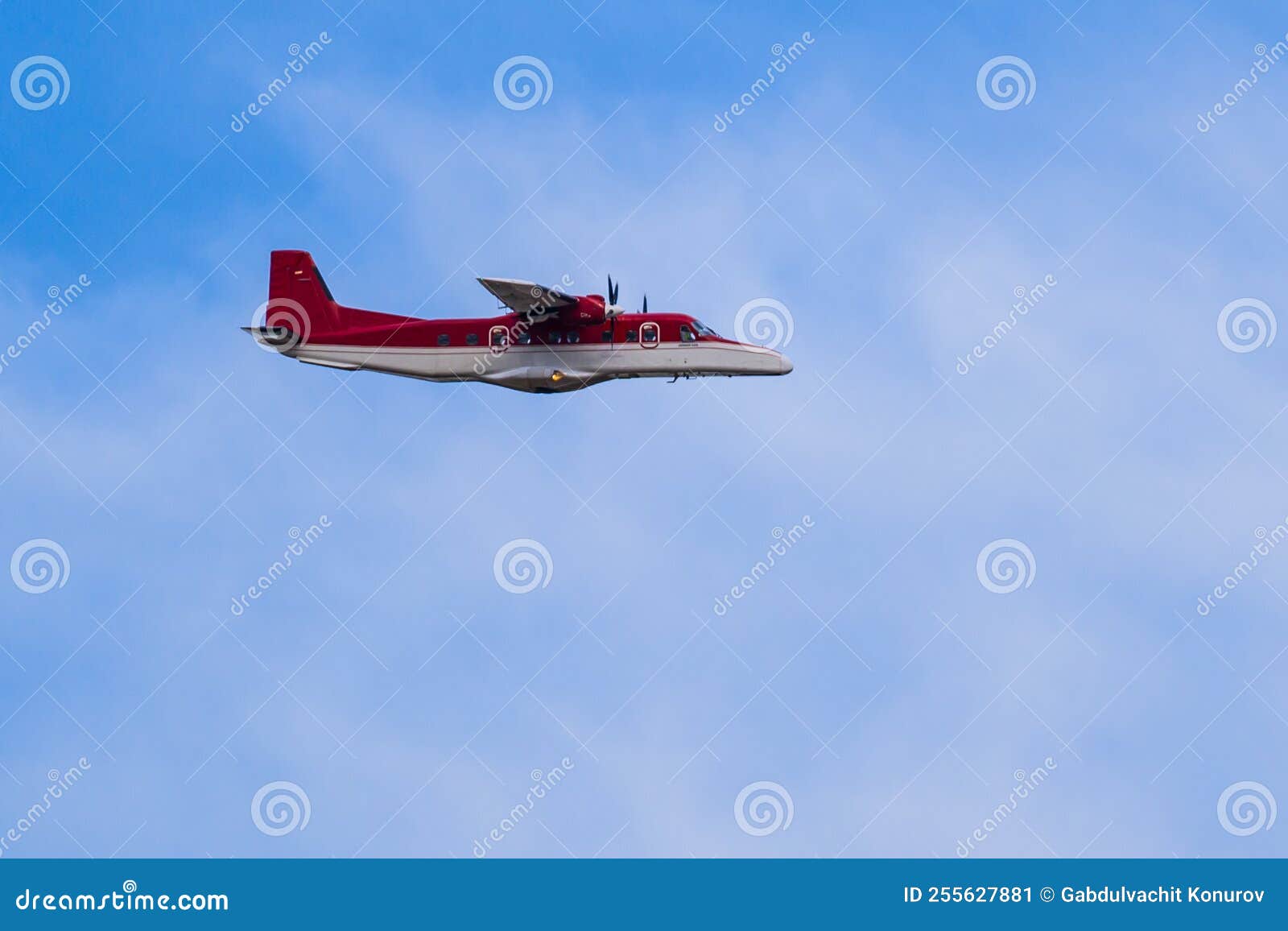 Red White Two-engine Plane Flying in Blue Sky Stock Image - Image of ...