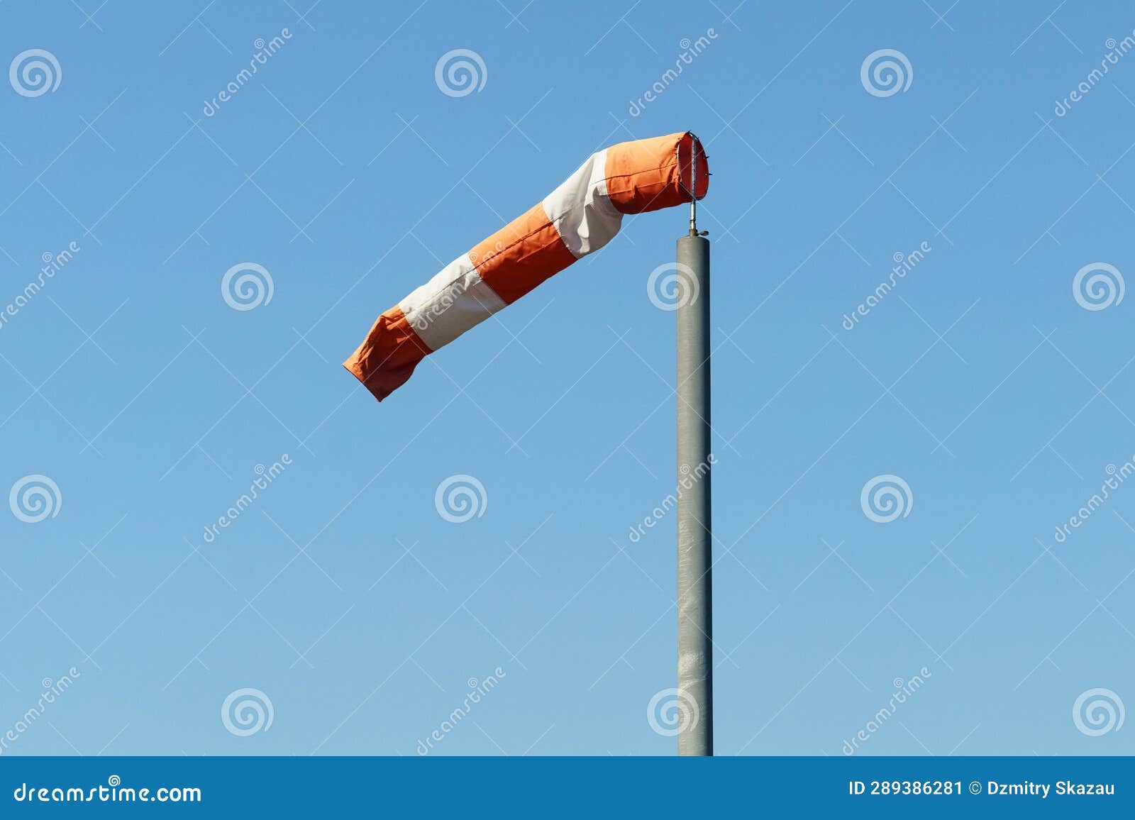 A Red and White Wind Cone Indicating the Direction and Strength of the ...