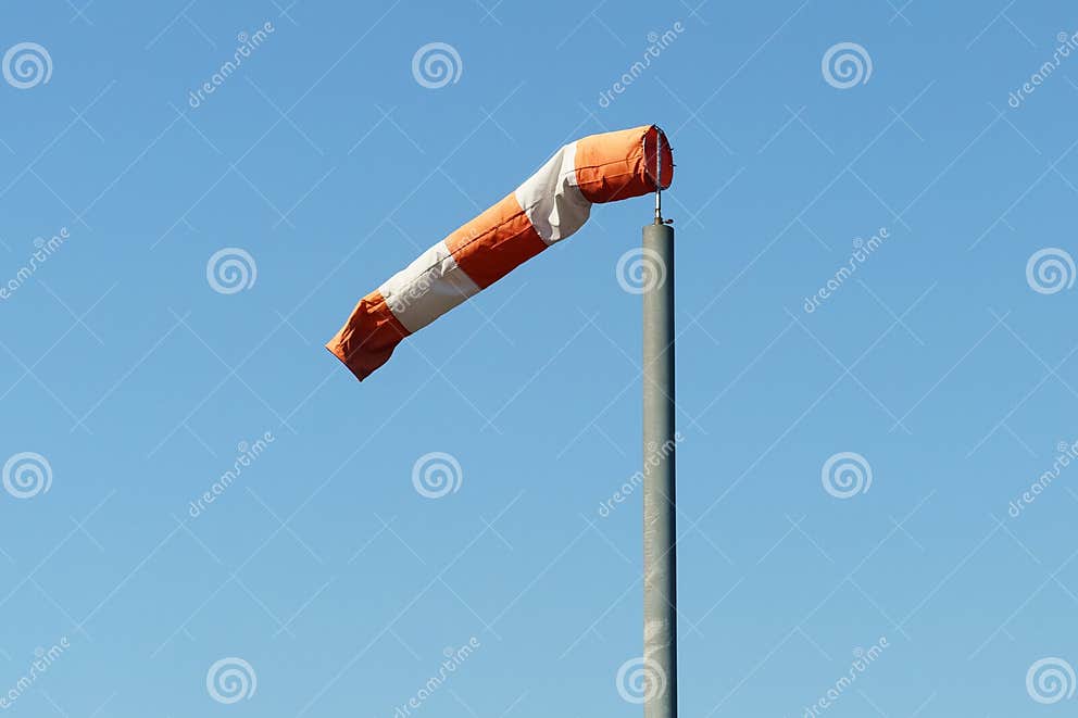 A Red and White Wind Cone Indicating the Direction and Strength of the ...