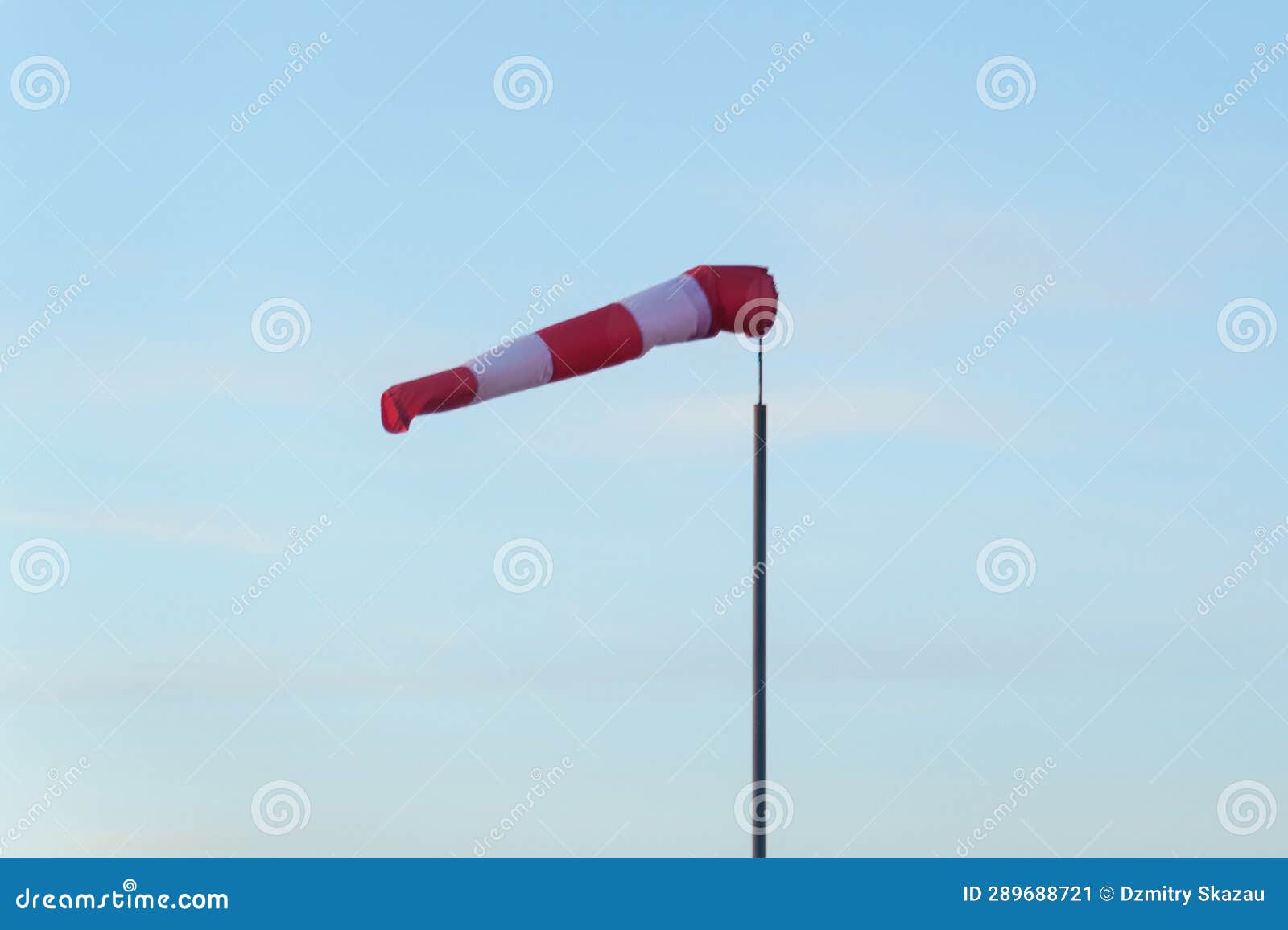 A Red and White Wind Cone Indicating the Direction and Strength of the ...