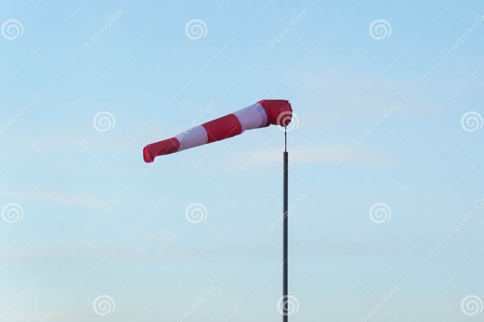 A Red and White Wind Cone Indicating the Direction and Strength of the ...