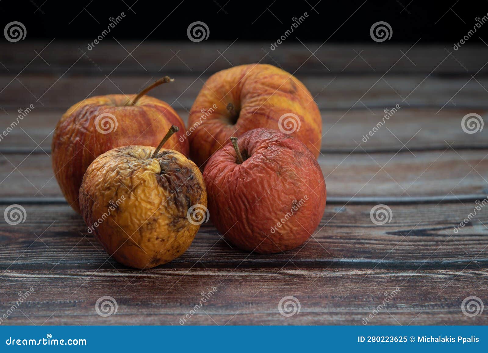 Red Wilted Rotten Apples on a Table. Bacteria Infected Rotten Fruit ...