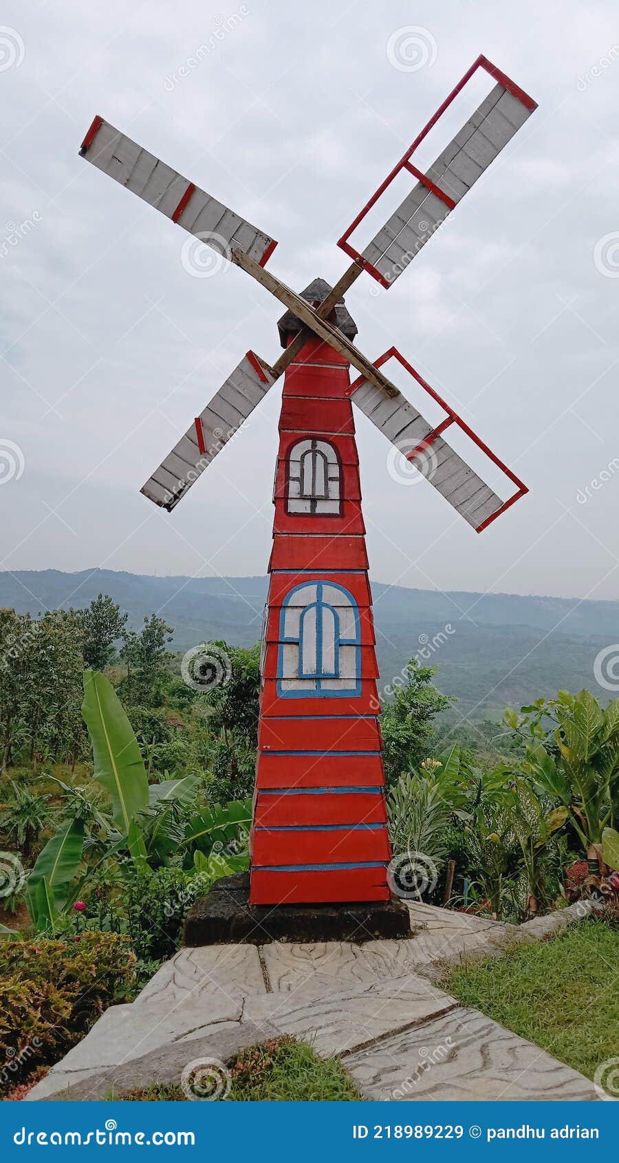 A red windmill stock image. Image of agriculture, colorful - 218989229
