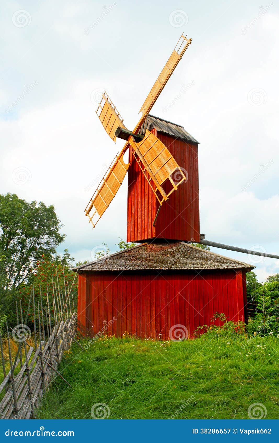 Red Windmill with Archaic Fence. Stock Image - Image of windmill ...