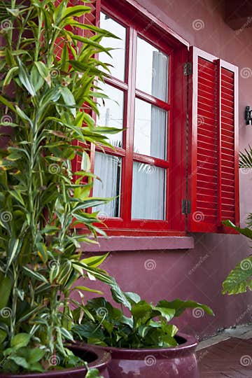 A red window stock image. Image of building, louver, color - 28656287