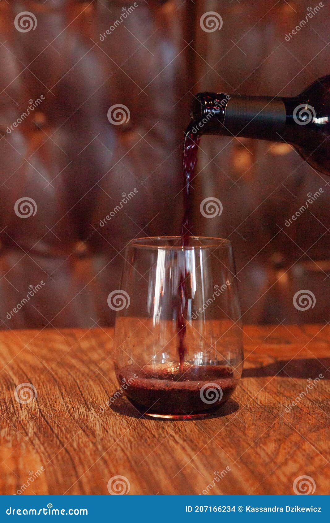 Red wine being poured stock photo. Image of glass, cocktail - 207166234