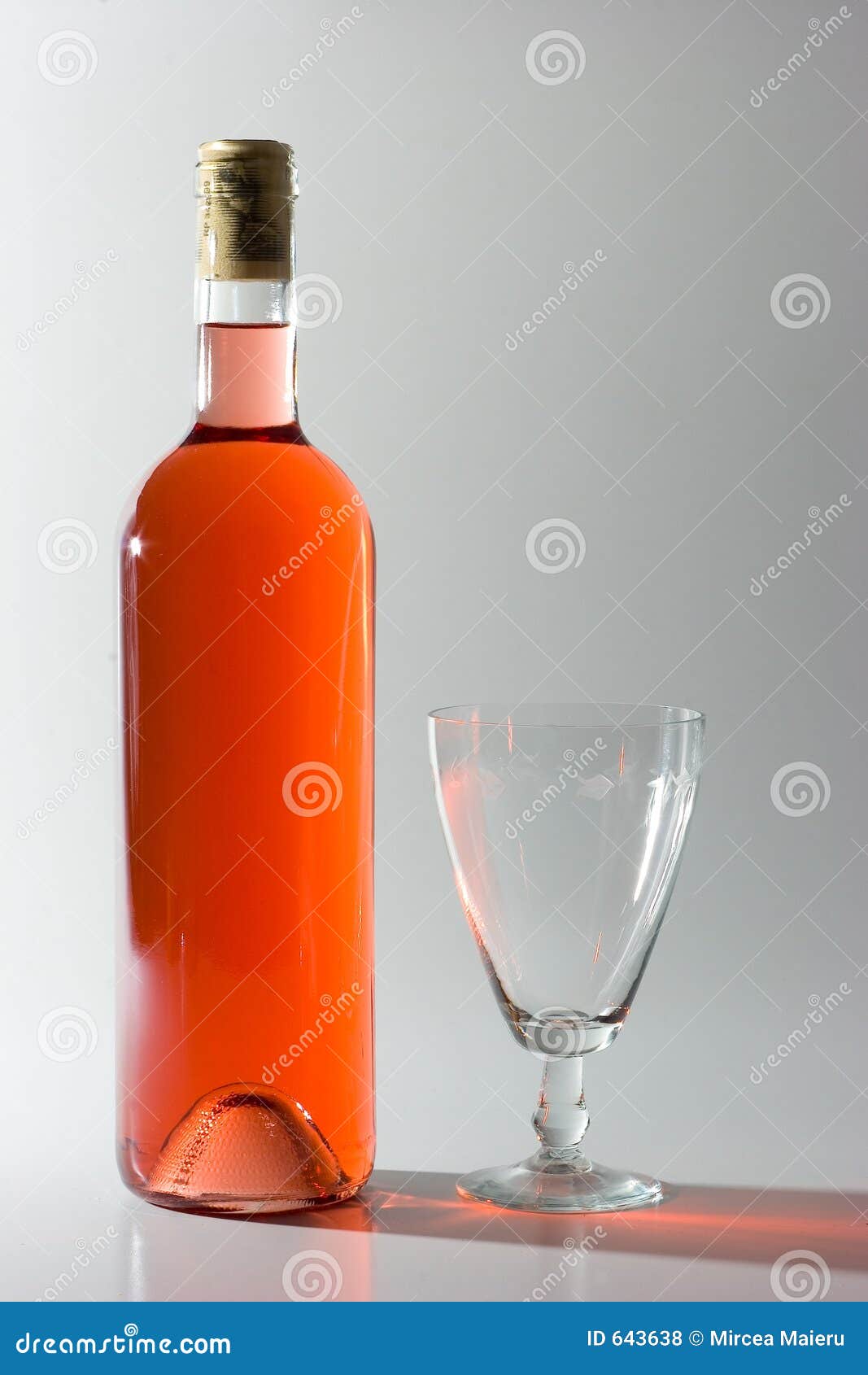 Red Wine Bottle and a Empty Glass Stock Photo - Image of opaque, bubbly ...