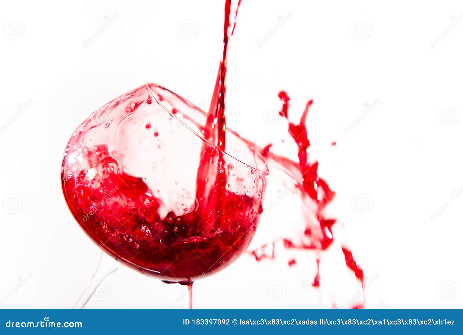Red Wine Falling in a Way Splashing into a Wine Glass Stock Photo ...