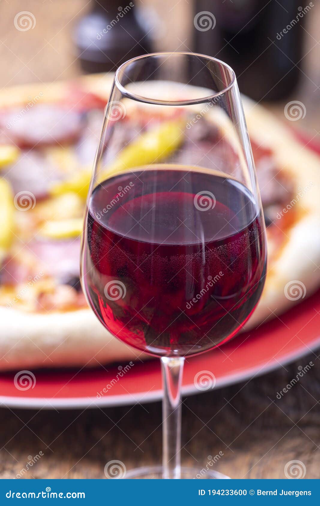 Red wine and pizza stock photo. Image of merlot, meat - 194233600
