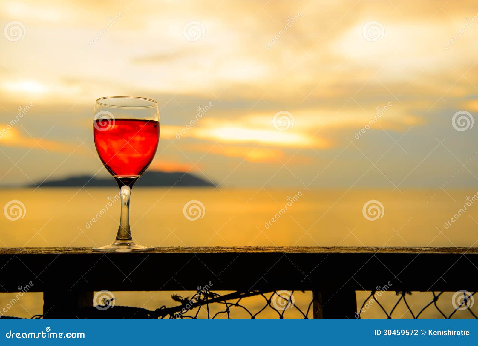 Red wine glass at sunset stock photo. Image of travel - 30459572