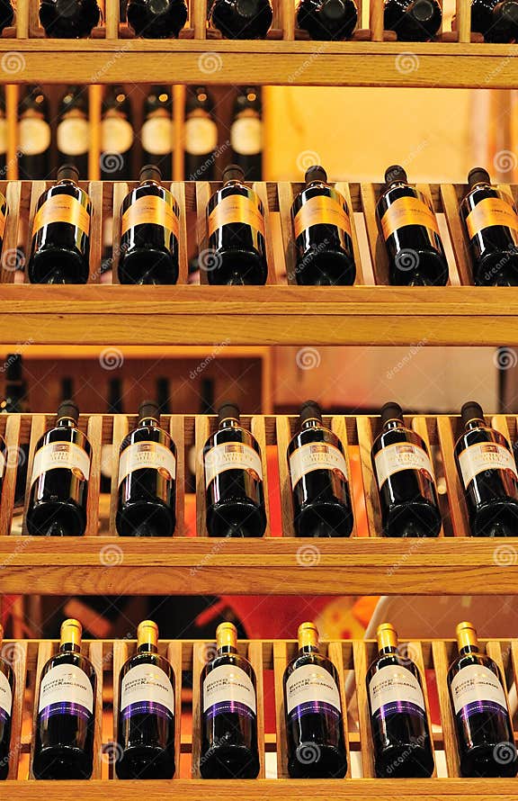 Red wines on storage shelf editorial photo. Image of interior - 26508406