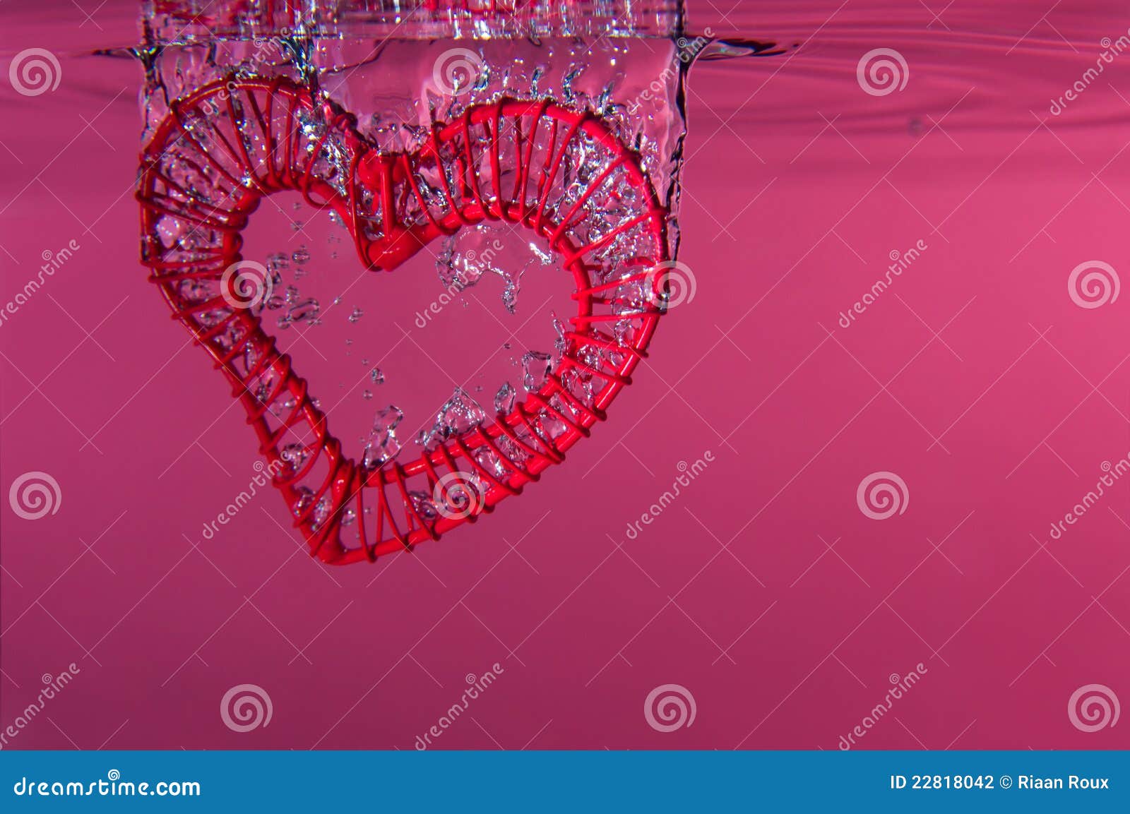 Red Wire Heart Falling into Water Stock Photo - Image of love, heart ...