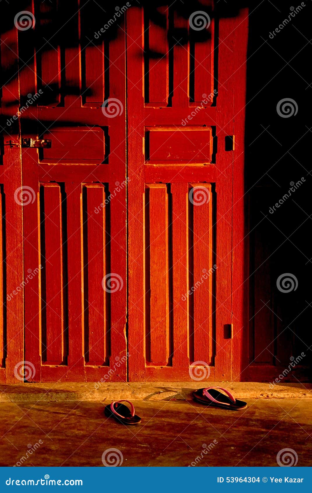 Red wood door and slippers stock photo. Image of afternoon - 53964304