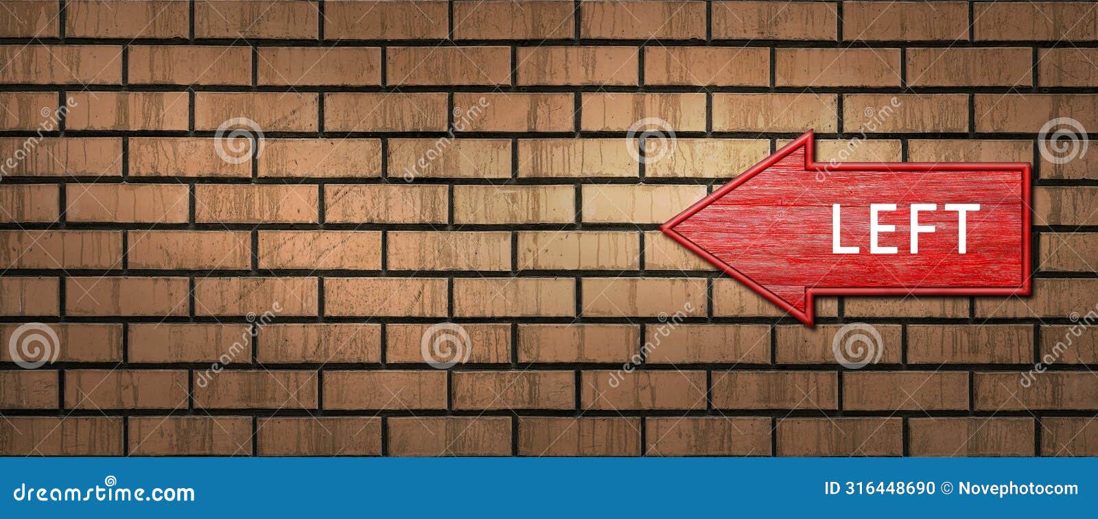 Red Wooden Arrow Sign with the Word LEFT Hanging on a Dark Brick Wall ...