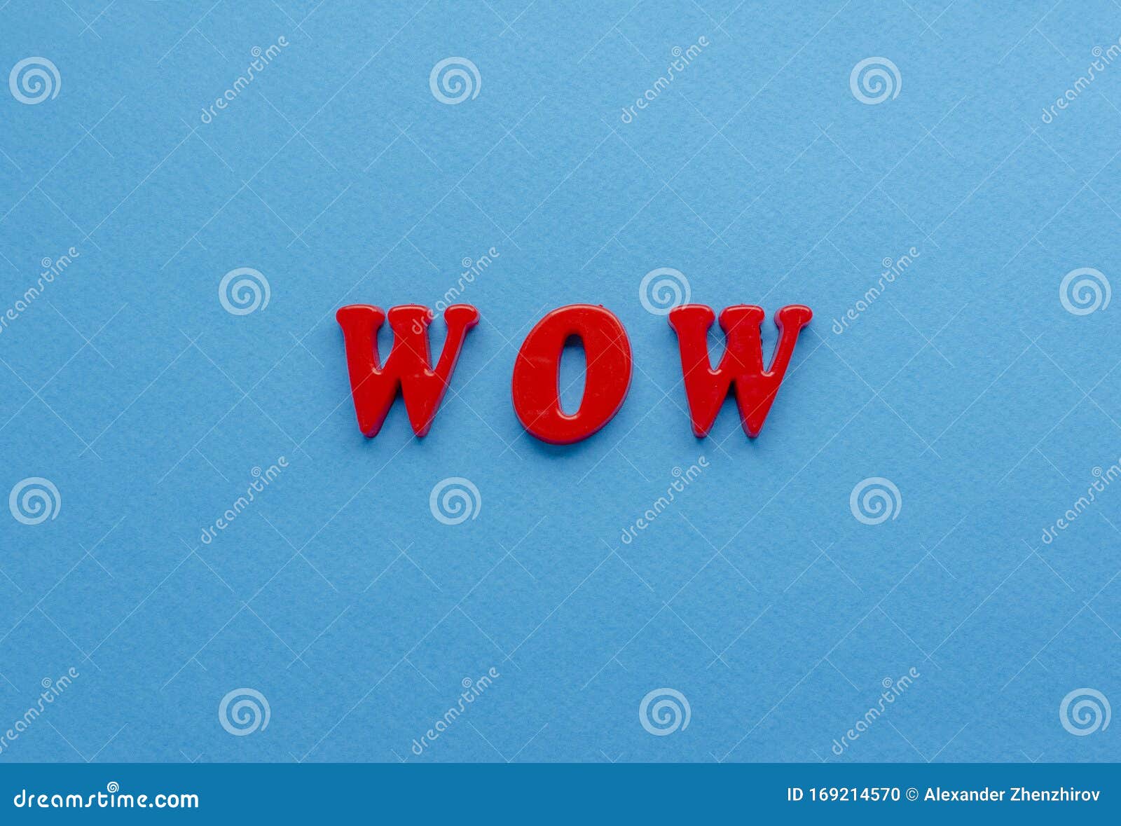 Red Wow on Blue Paper Background Stock Photo - Image of cool, explosion ...