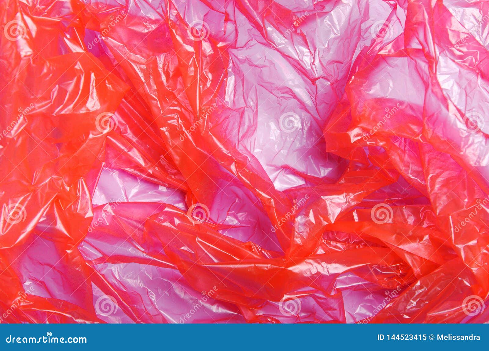Red Wrap, Package Polypropylene, Plastic Packaging on a Blue Background ...