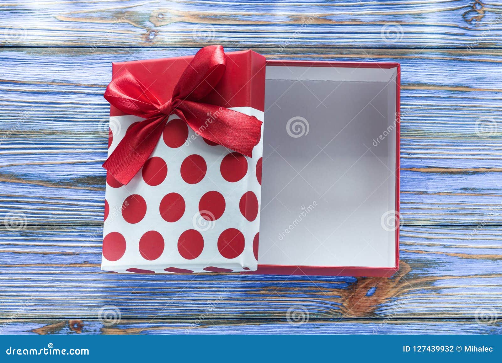 Red Wrapped Present Box on Vintage Wooden Board Stock Photo - Image of ...