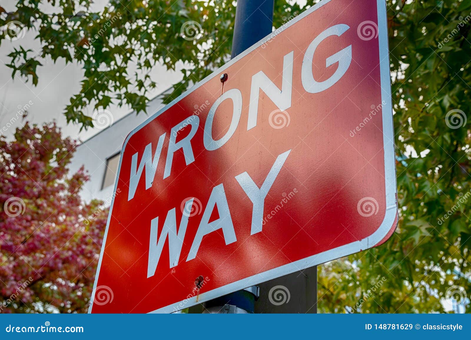 Red Wrong Way Sign on a Post Stock Image - Image of direction, metal ...
