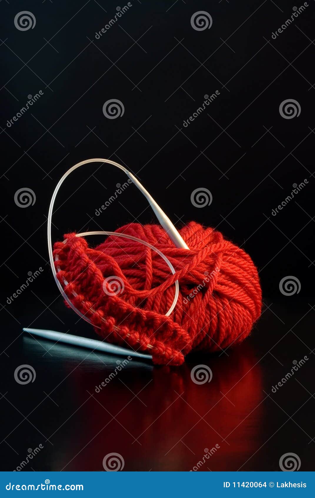 Red yarn ball with needles stock photo. Image of making - 11420064